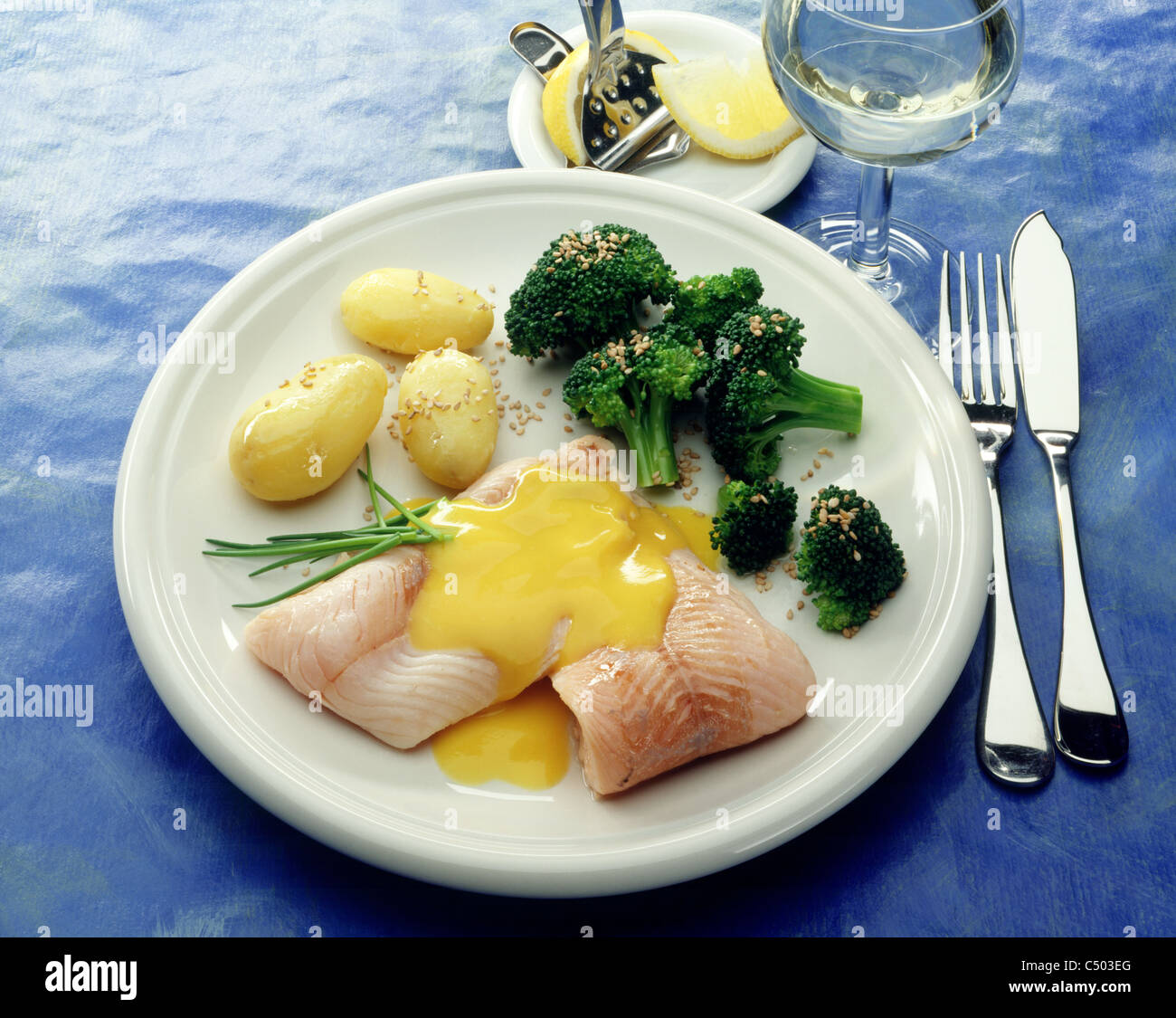 Poached trout fillet with saffron sauce Stock Photo - Alamy