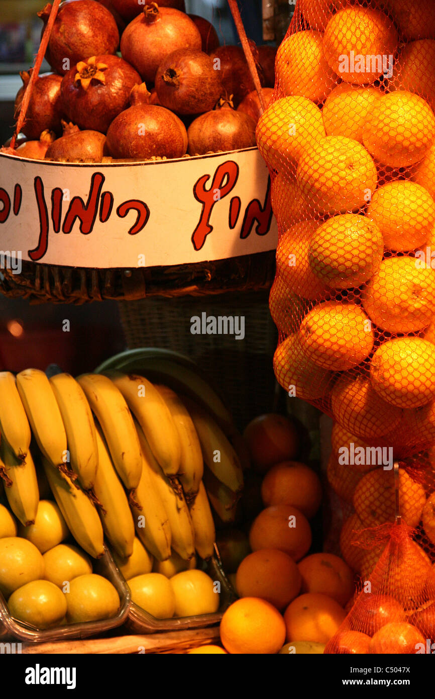 Different fruits displayed in a fruit stall in the center of Tel Aviv ...