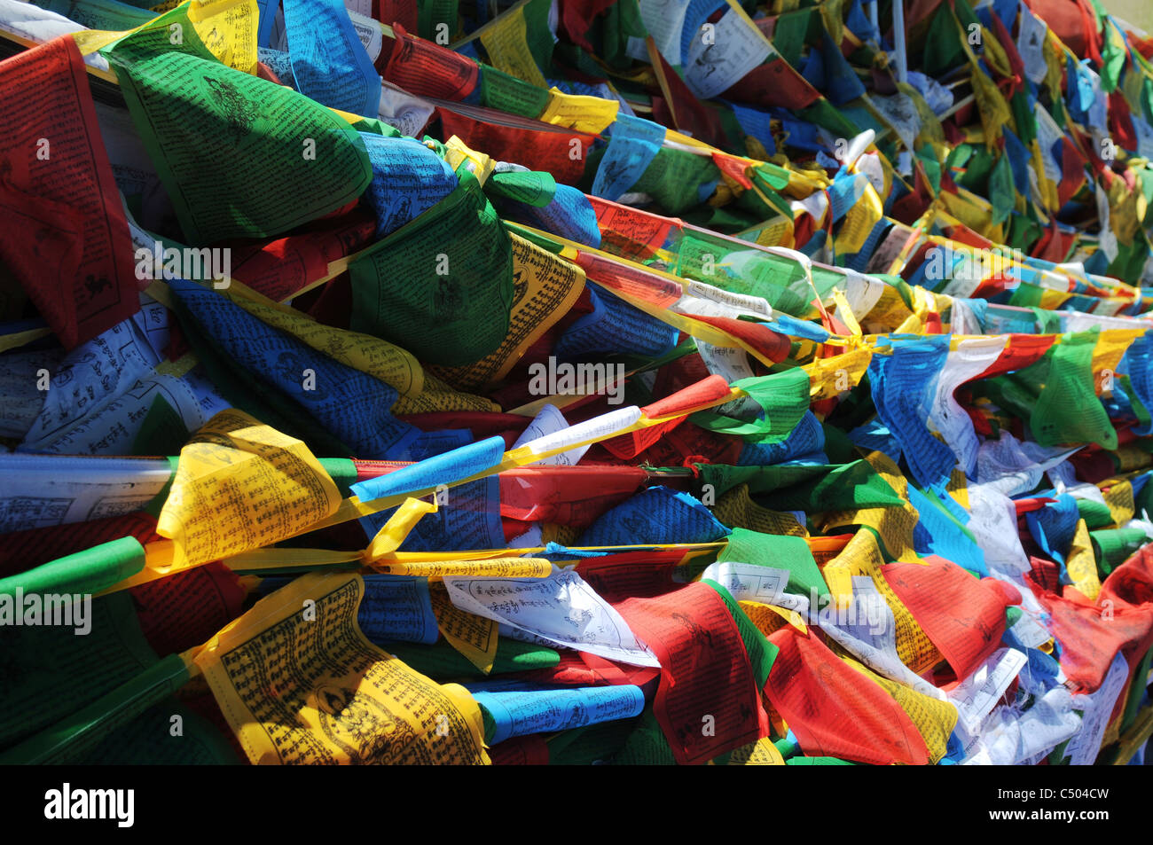Scenery of colorful prayer flags in Tibet Stock Photo - Alamy