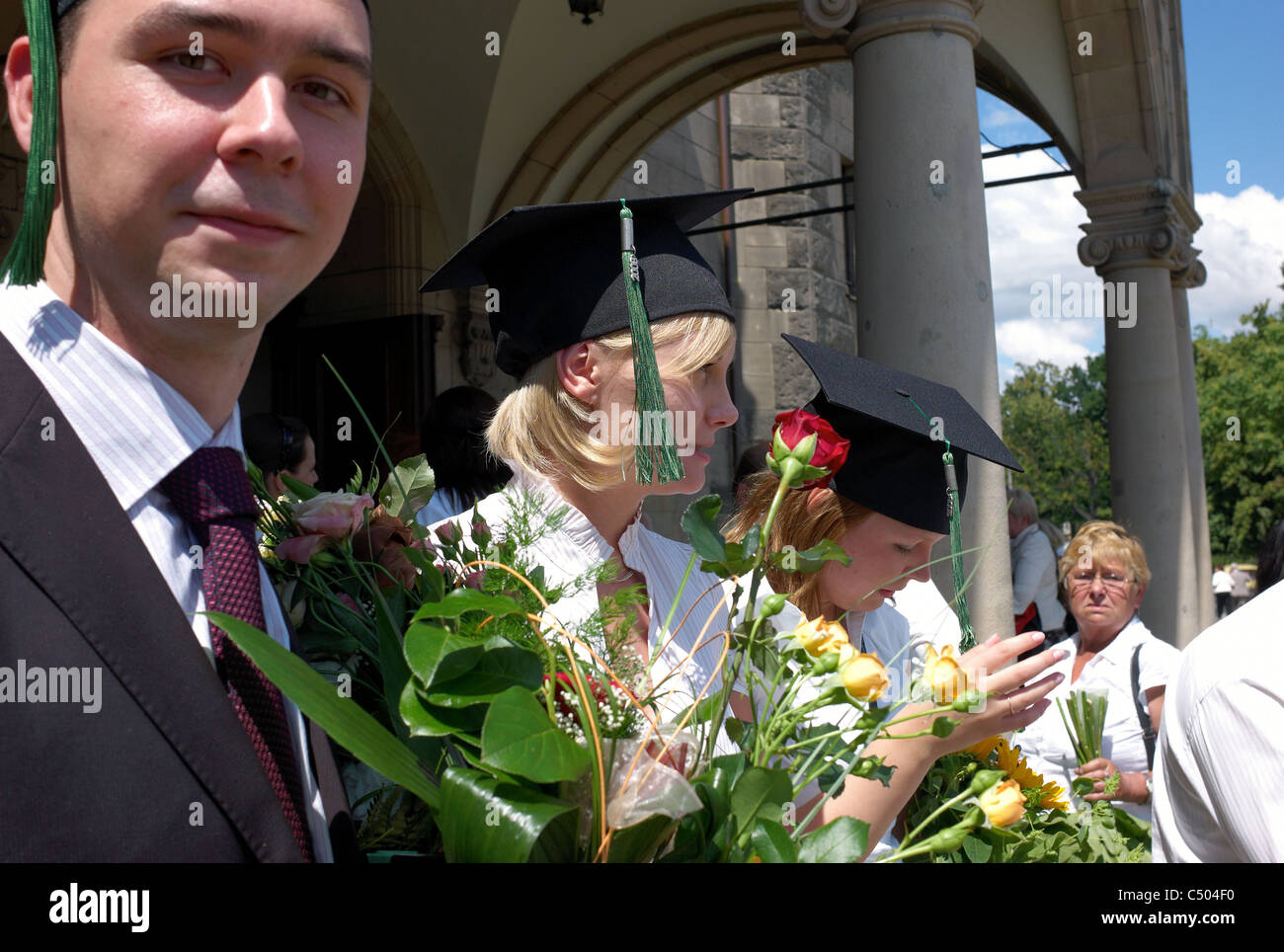 Students of the Adam Mickiewicz University after the graduation ...