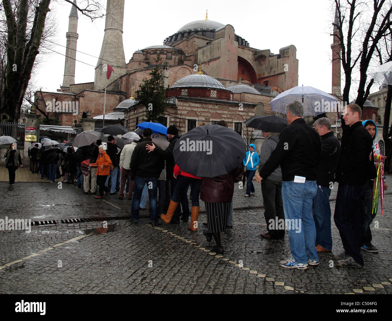 Turkey Istanbul tourist to Hagia Sofia in the rain Stock Photo - Alamy