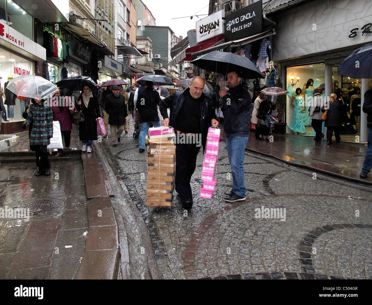 Turkey Istanbul Sultanahmet old town Turkish walking in the rain Stock ...