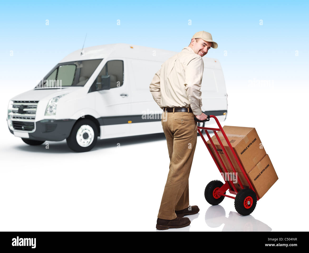 smiling caucasian worker in uniform with handtruck Stock Photo - Alamy