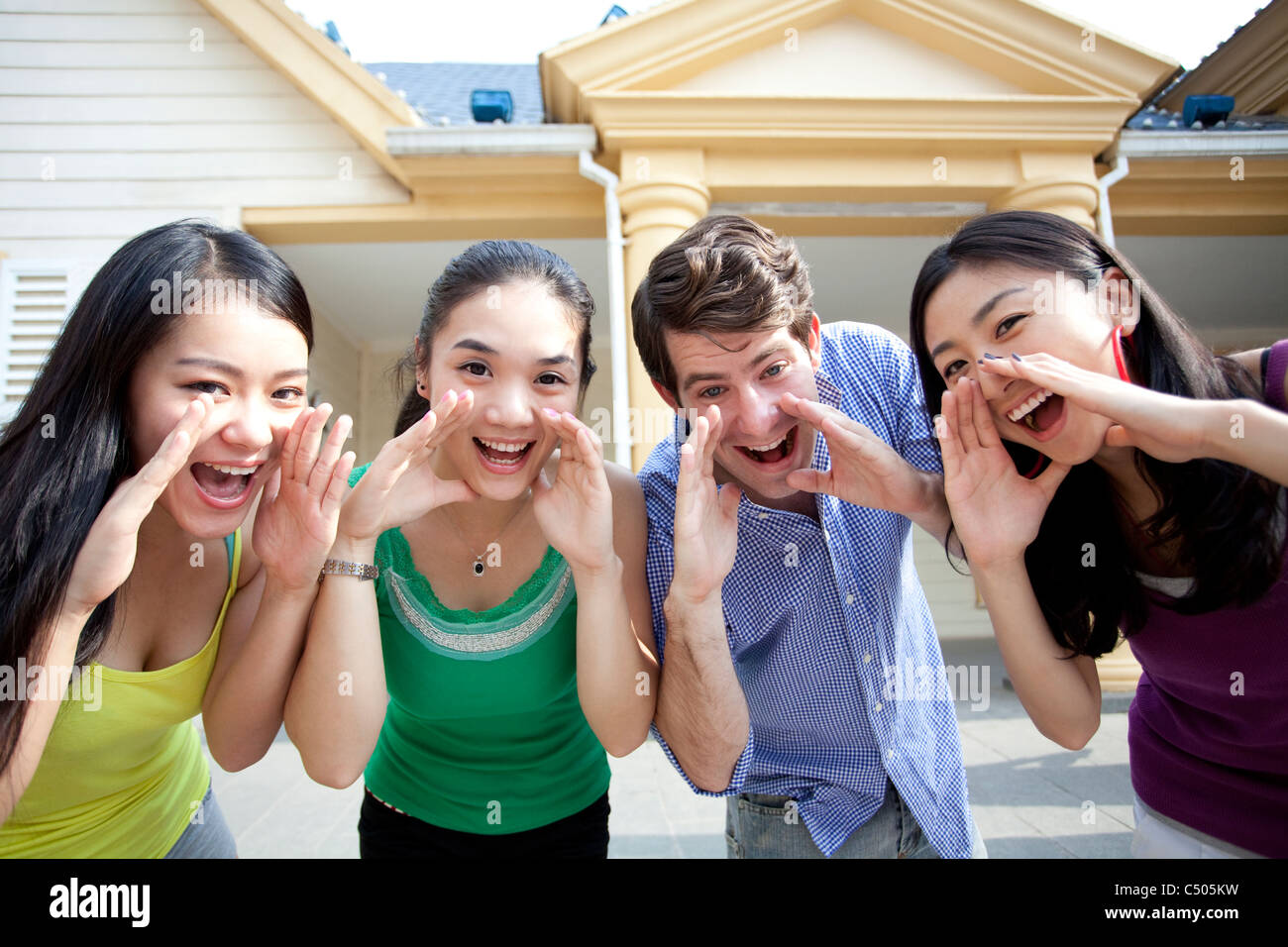 Friends Shouting with Excitement Stock Photo - Alamy