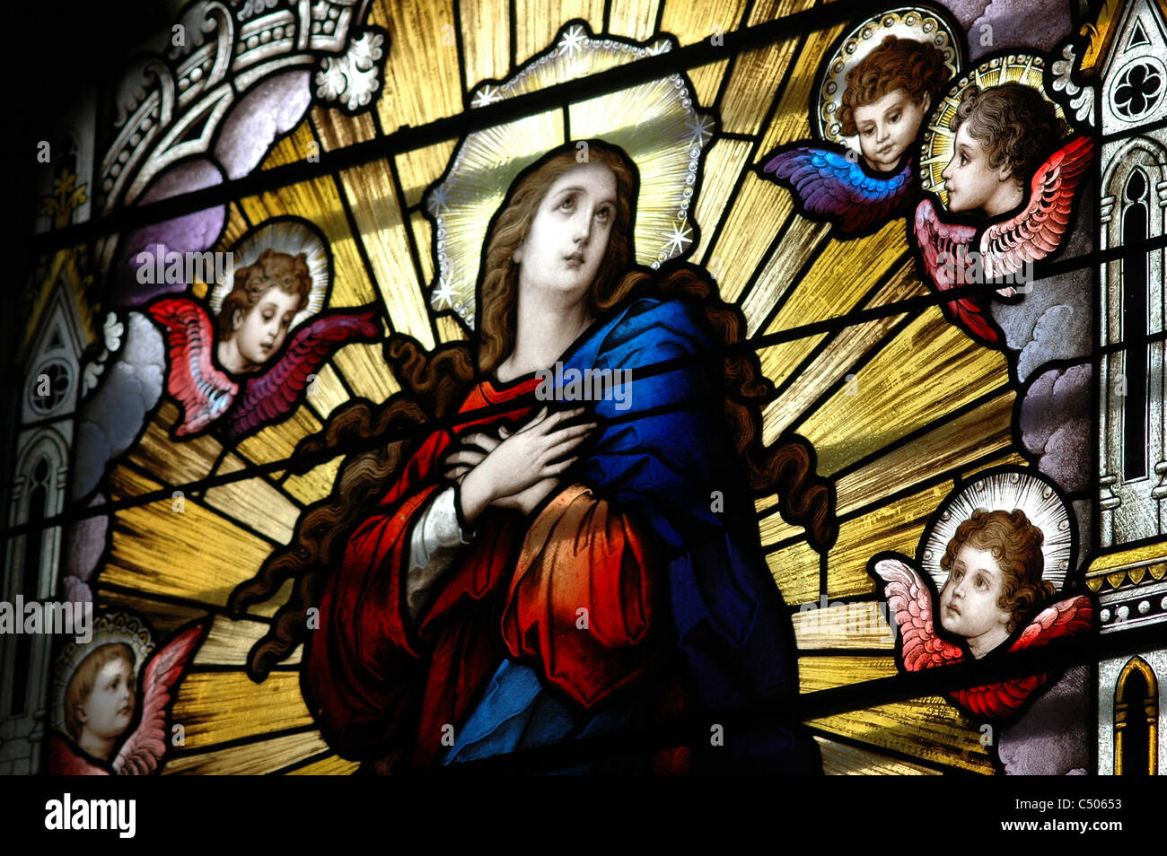 A stained glass window depicting an angel Stock Photo - Alamy