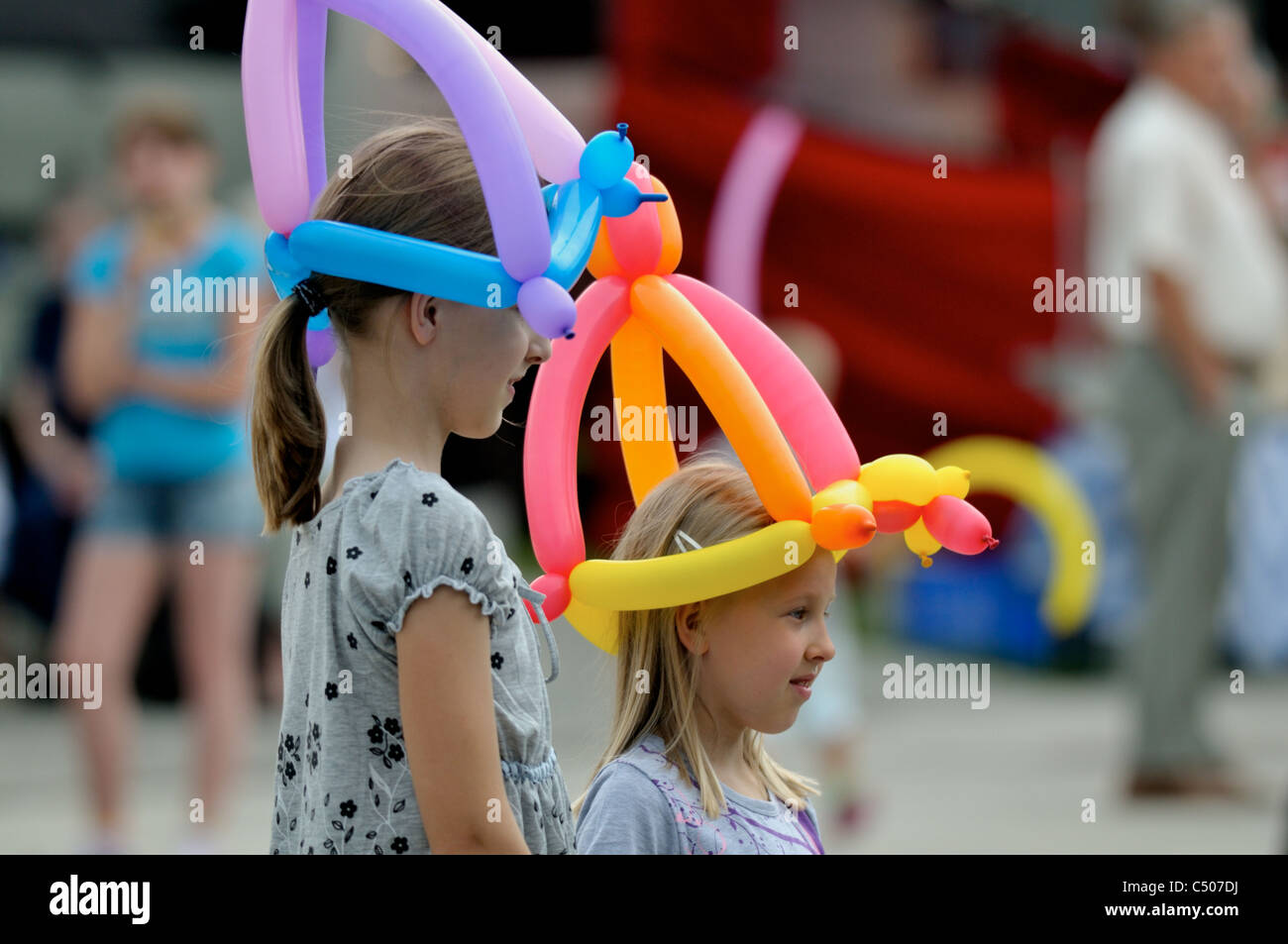Young girls at the fun fair Stock Photo - Alamy