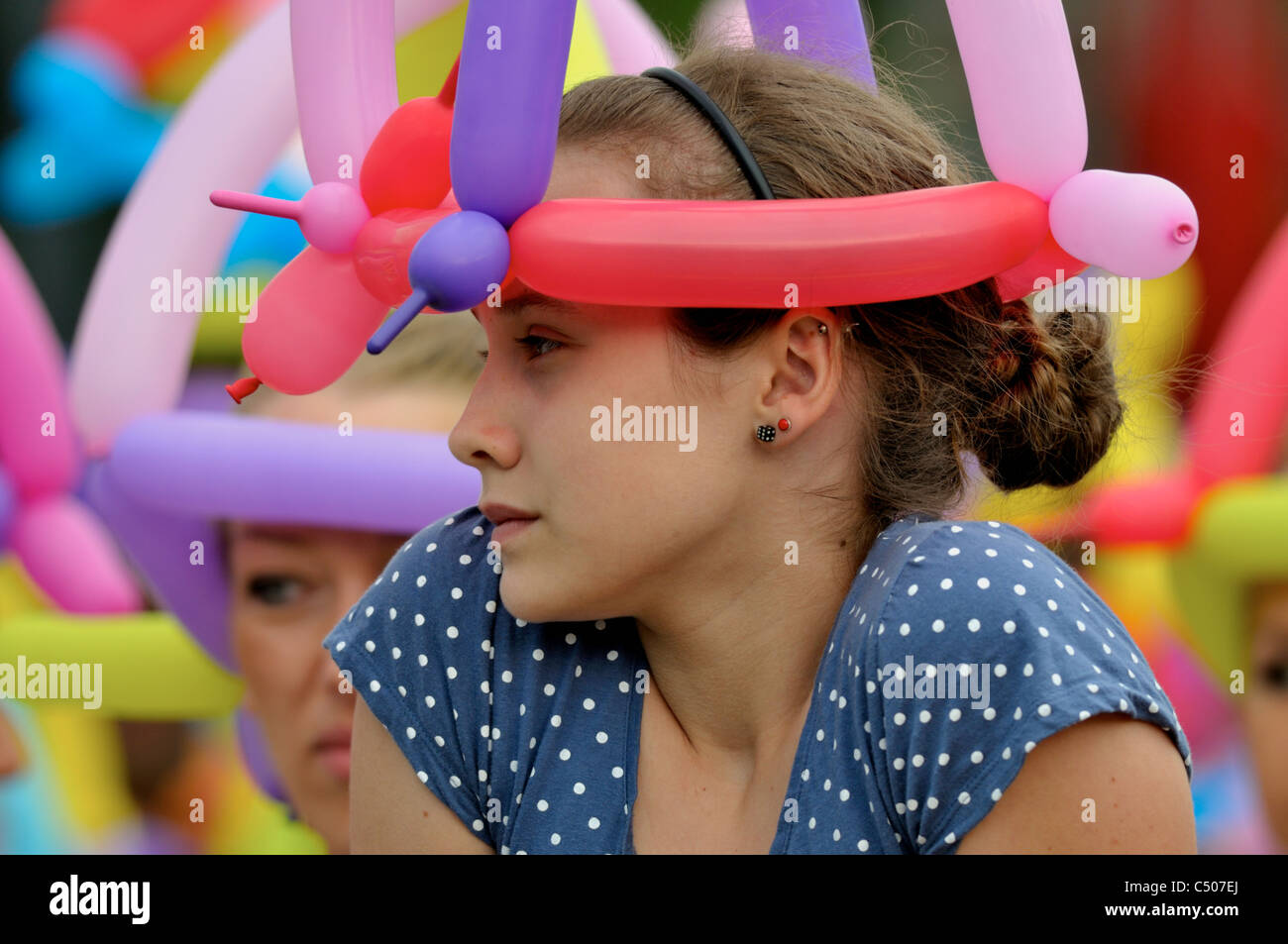 Young girl at the fun fair Stock Photo - Alamy