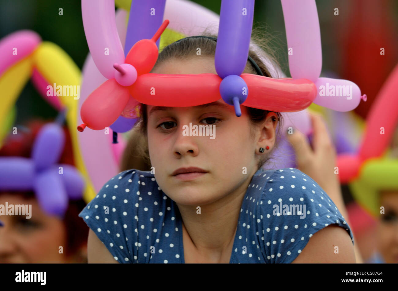 Young girl at the fun fair Stock Photo - Alamy