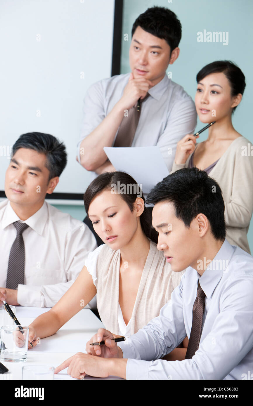 Business Team In Meeting Stock Photo - Alamy
