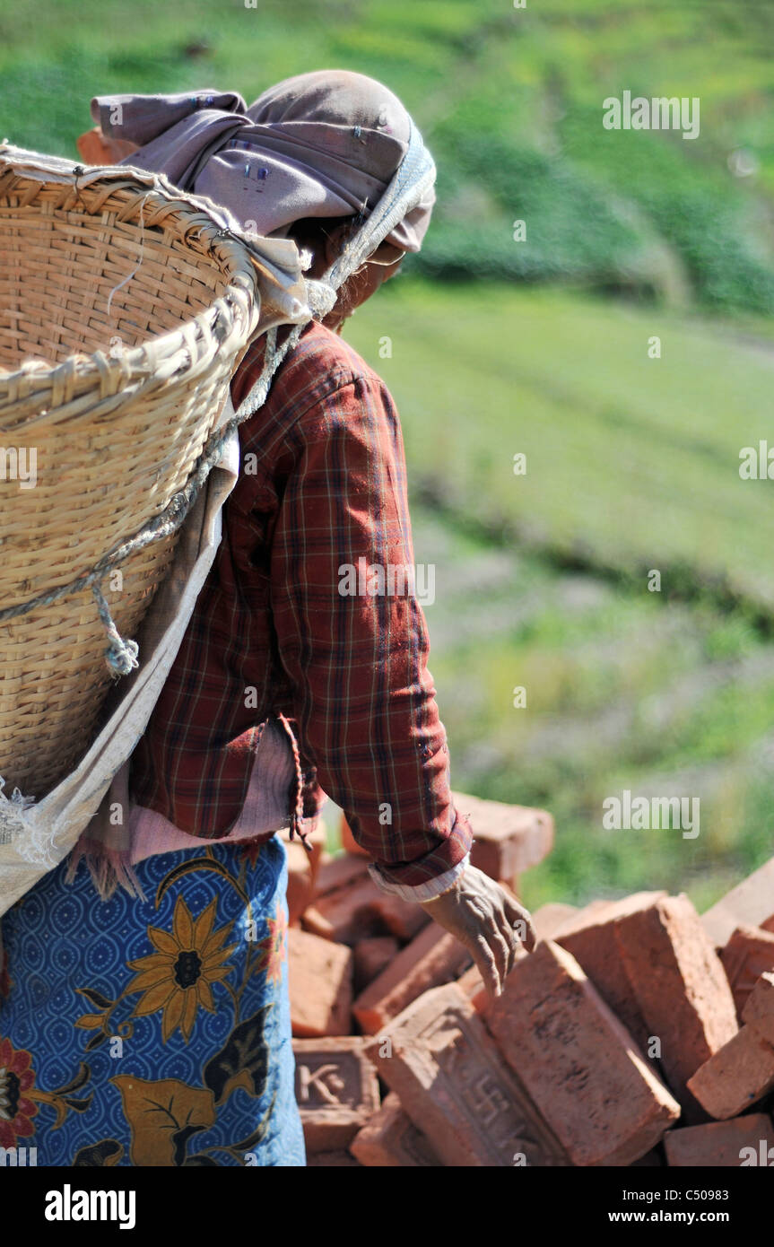 A Nepali woman working in a bricks factory in the Kathmandu valley ...