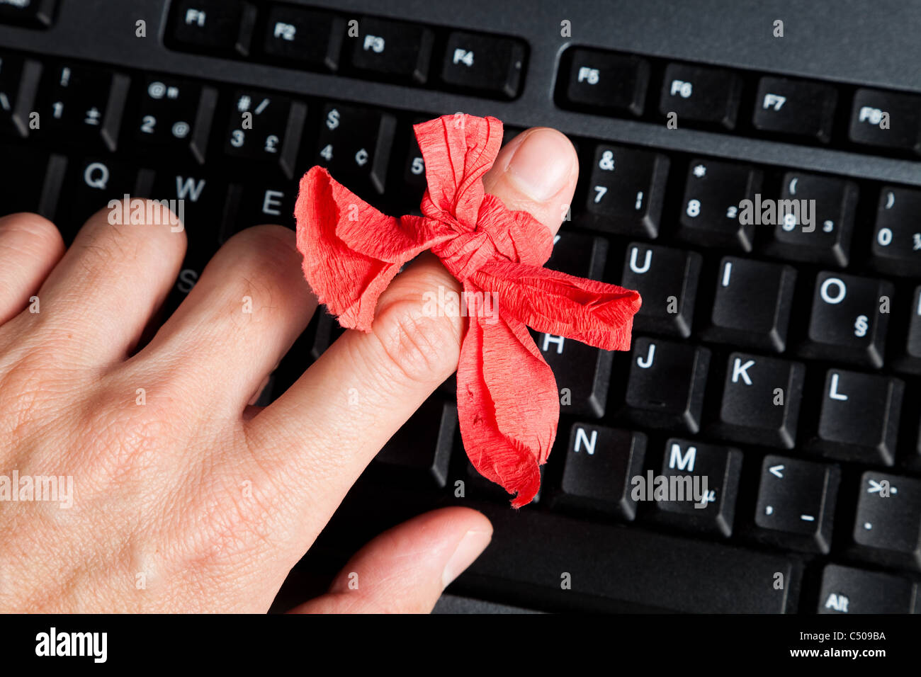 Reminder ribbon finger hi-res stock photography and images - Alamy