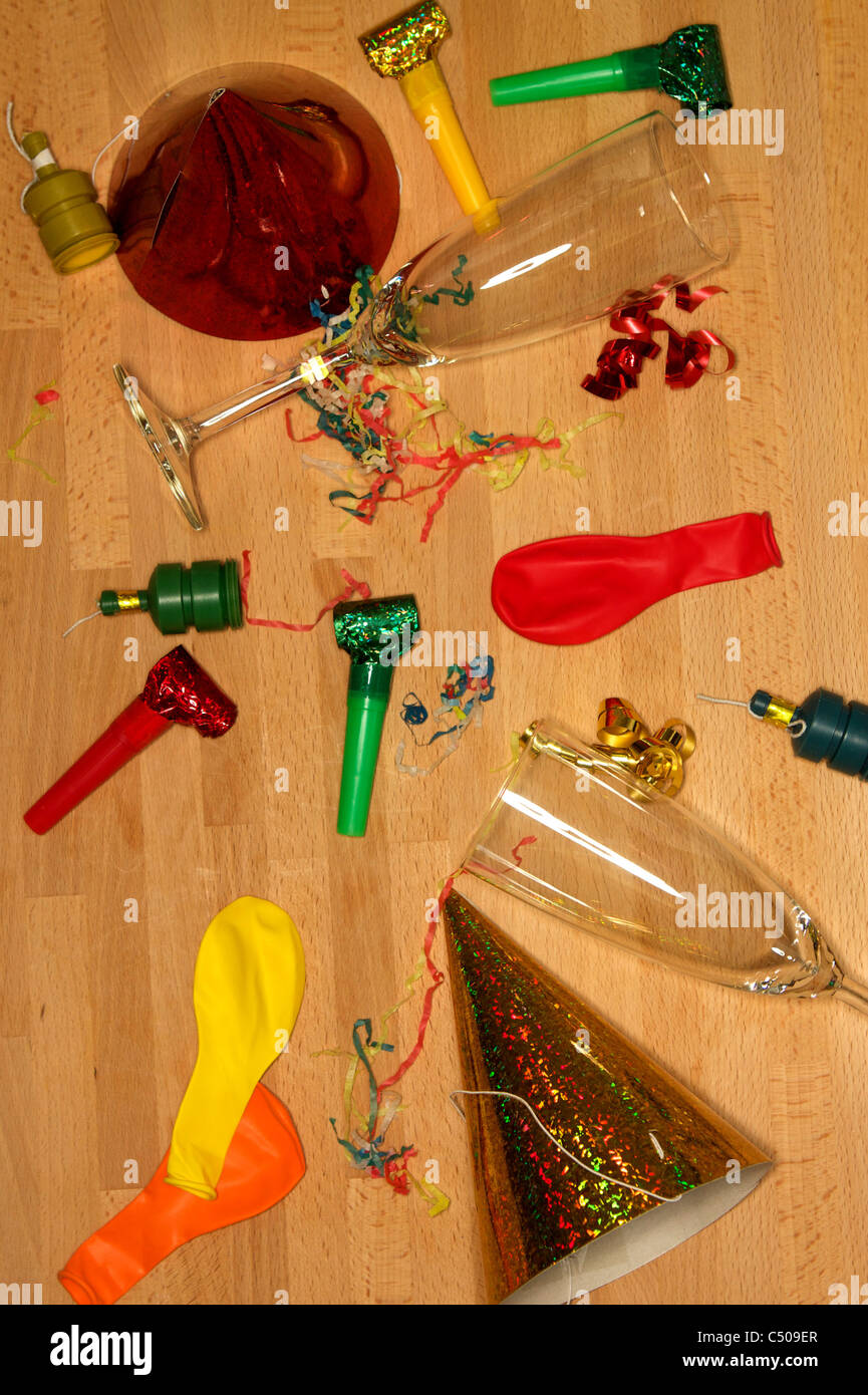 Assorted party items on a wooden floor Stock Photo - Alamy