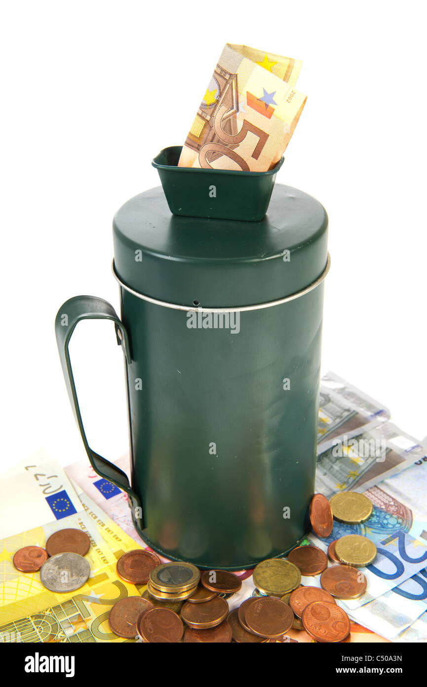 Green collection box with a lot of money Stock Photo - Alamy