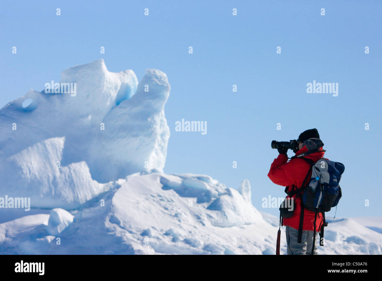 Tourist photographing iceberg, Snow Hill Island, Antarctica Stock Photo ...