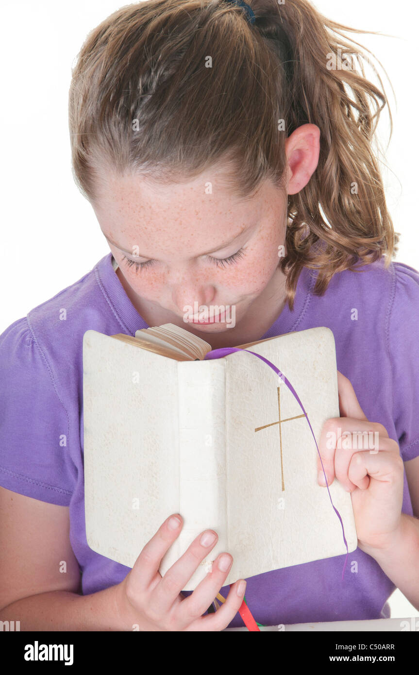 girl in prayer with Bible Stock Photo - Alamy