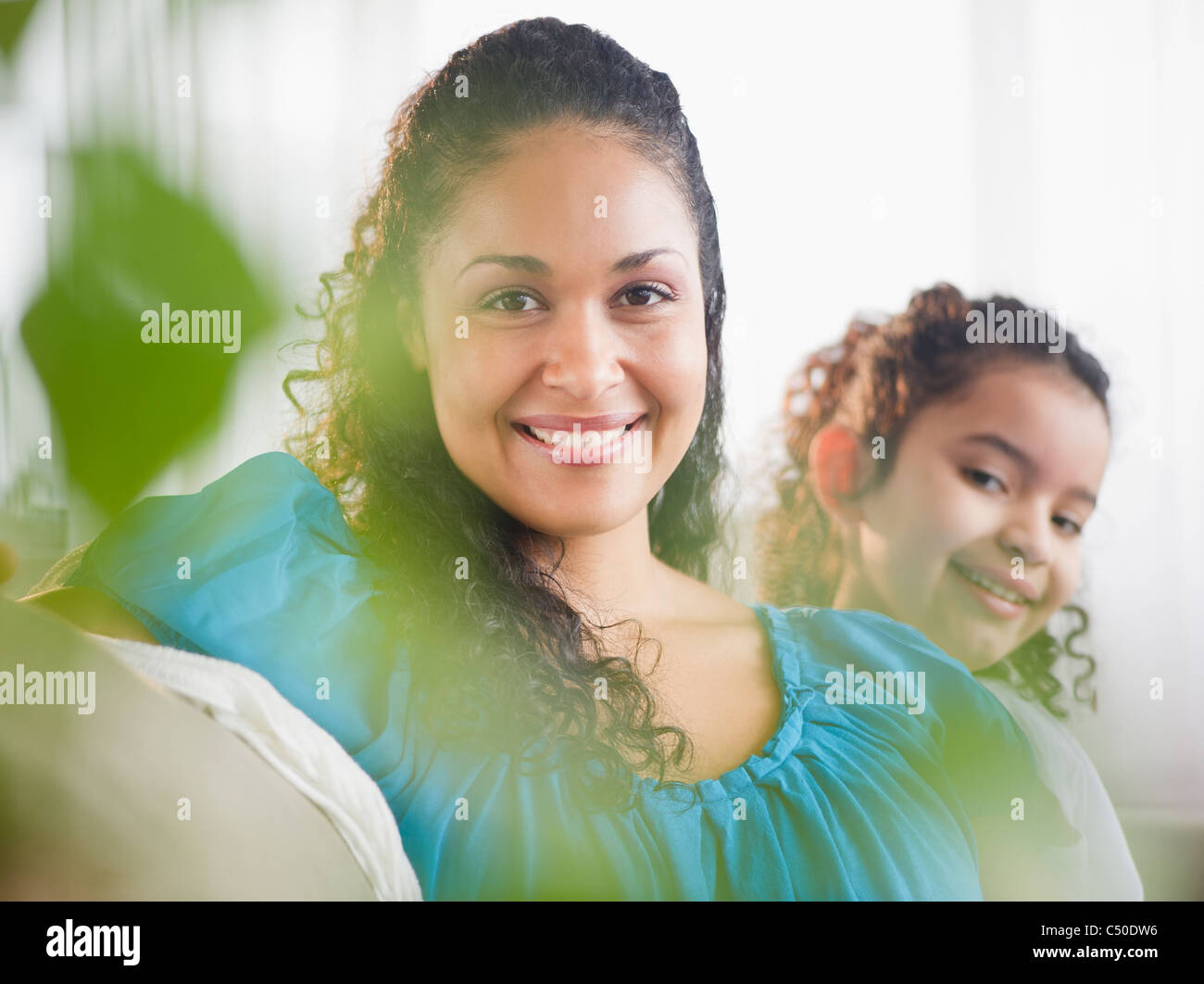 Smiling mother and daughter Stock Photo - Alamy