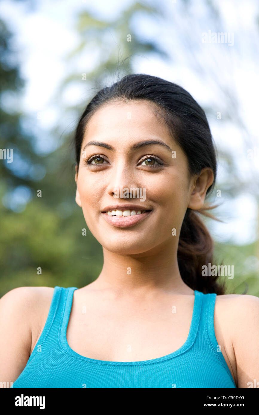 Smiling Indian woman outdoors Stock Photo - Alamy