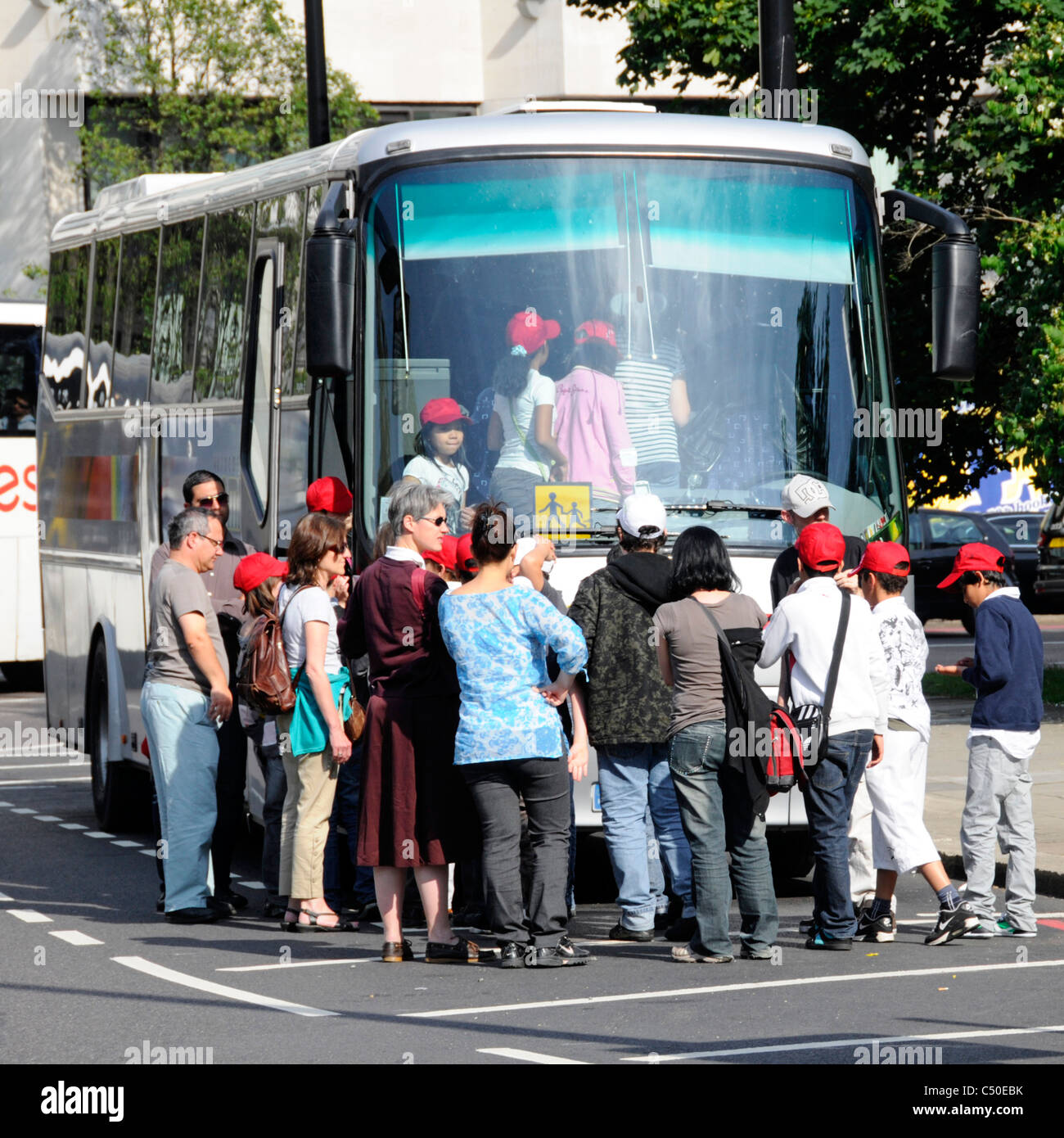 Children boarding bus uk hi-res stock photography and images - Alamy