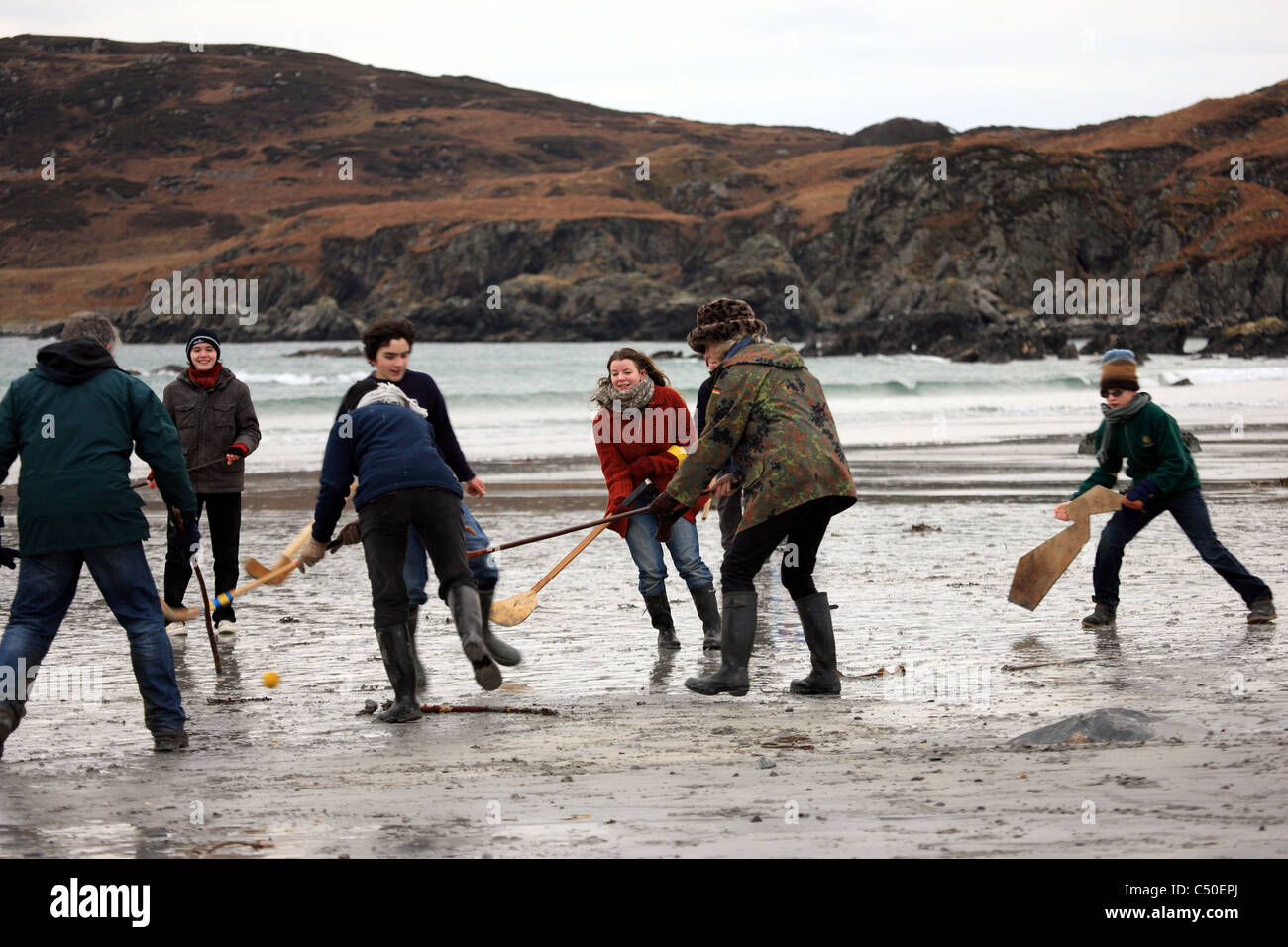 Shinty game played each New Years day at Ardalanish Beach on Mull Stock ...
