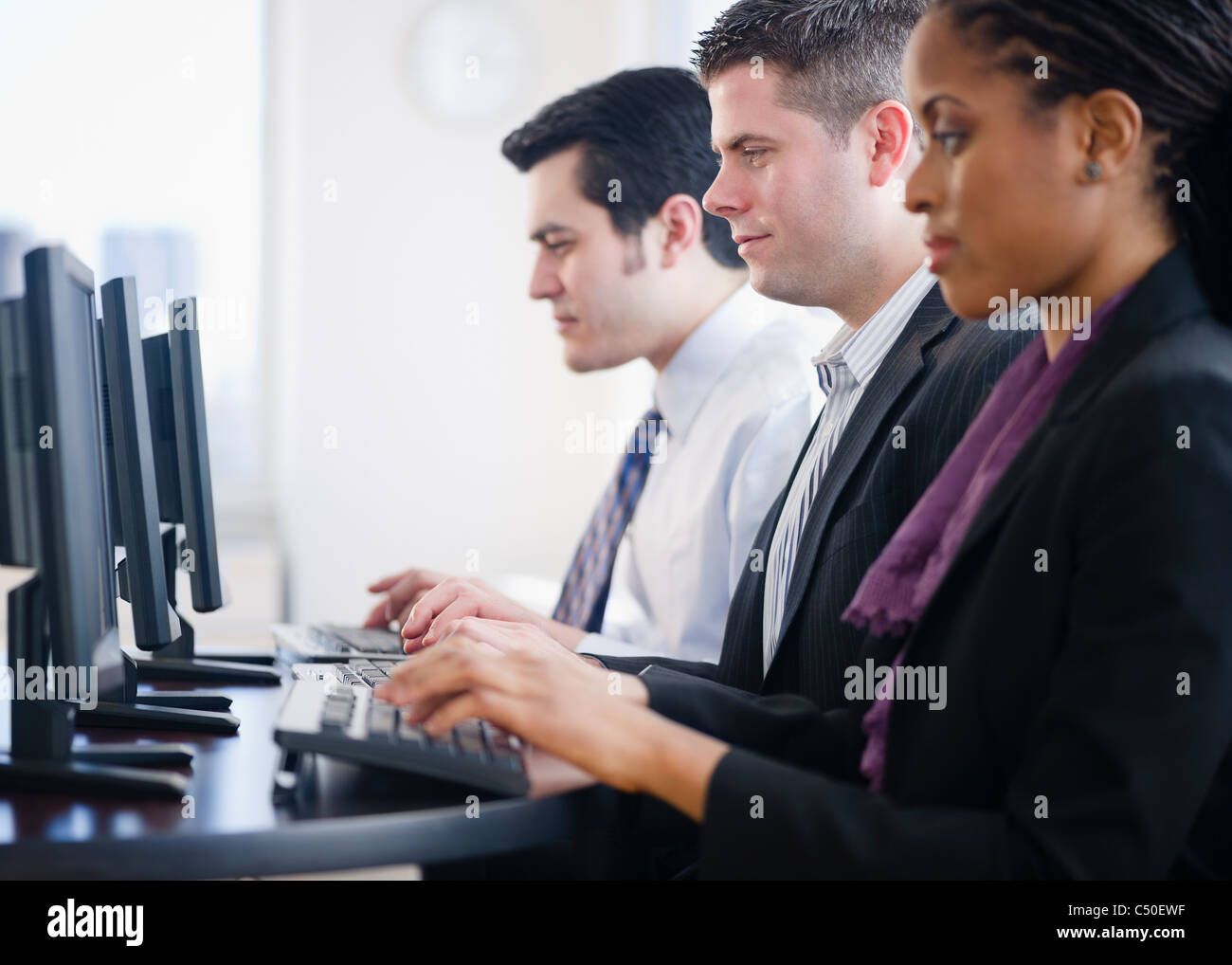 Men row computers hi-res stock photography and images - Alamy