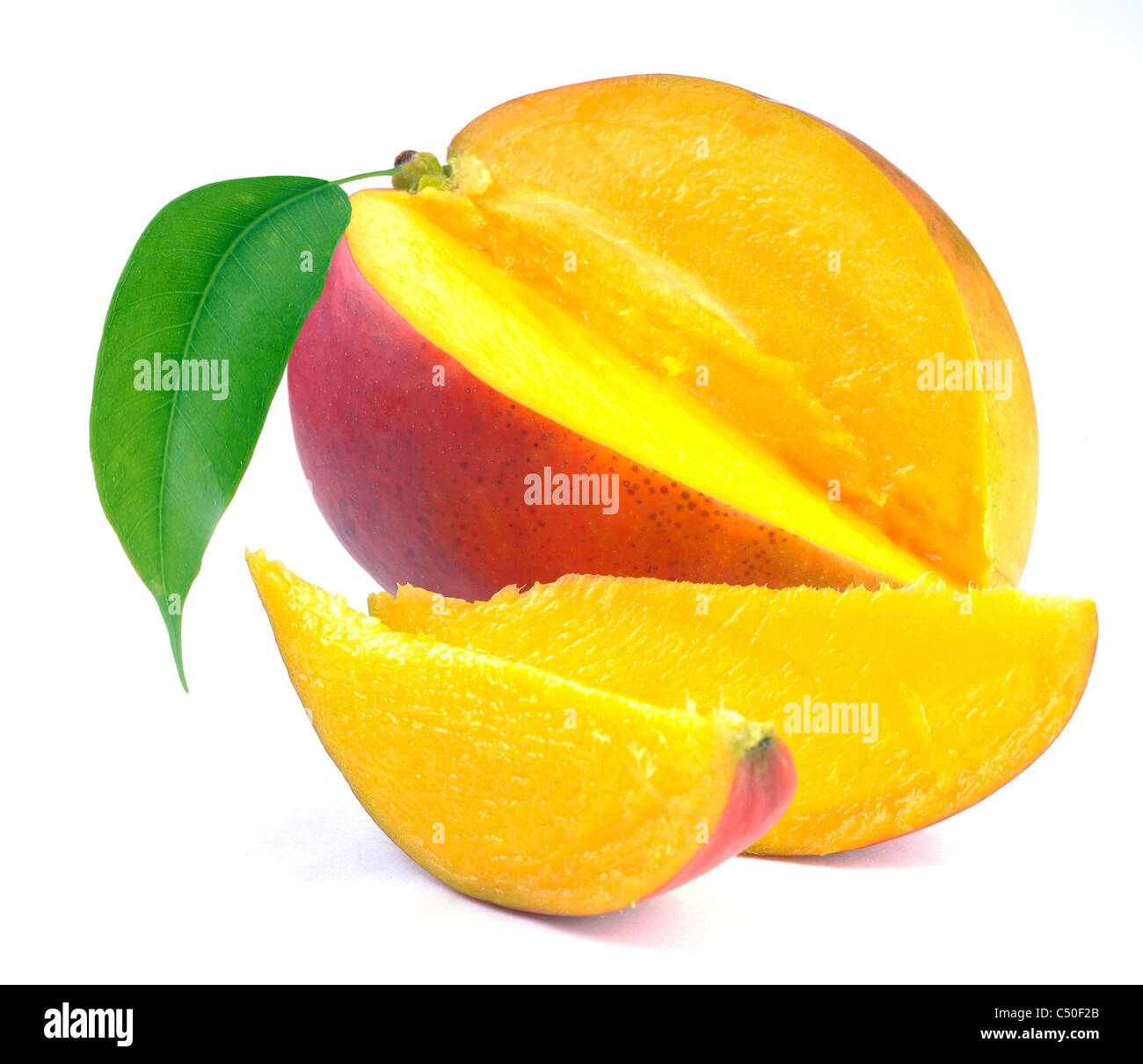Mango with section on a white background Stock Photo - Alamy