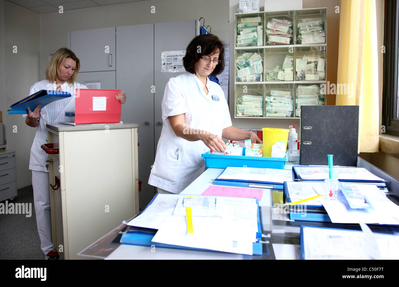 Hospital. Nurses working in a hospital ward, nurses office, doing ...