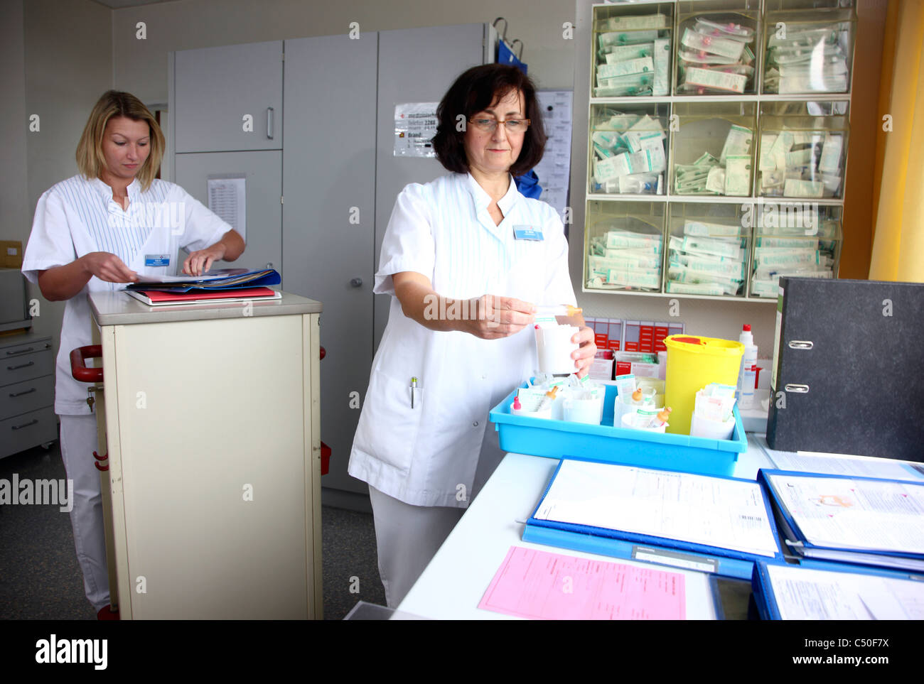 Hospital. Nurses working in a hospital ward, nurses office, doing ...