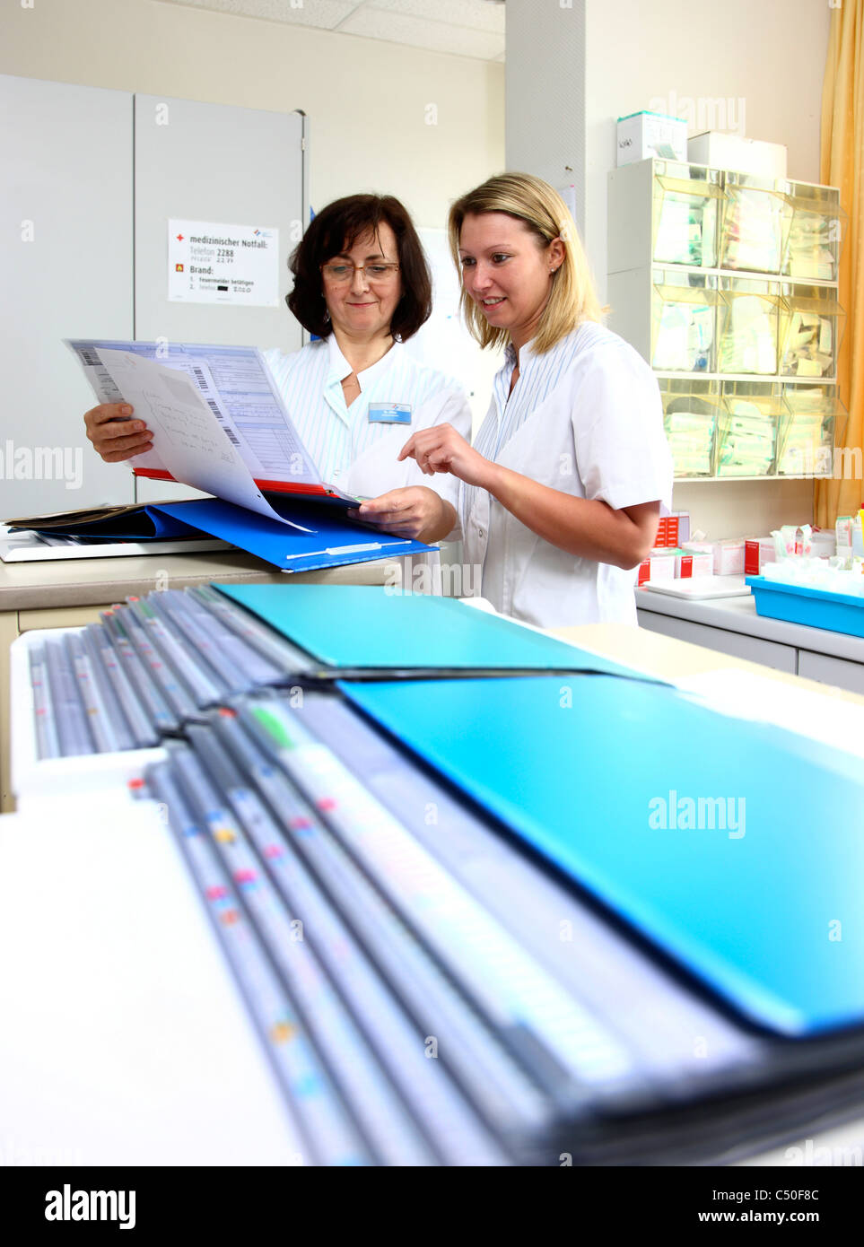 Ward staff paperwork hi-res stock photography and images - Alamy