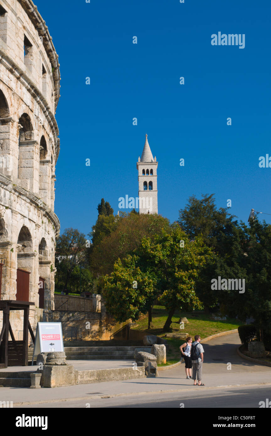 Tourists outside Arena the ancient amphitheatre exterior Pula the ...