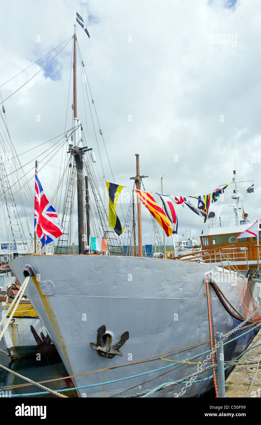 Colourful flags on a ship moored in Penzance Harbour Stock Photo - Alamy