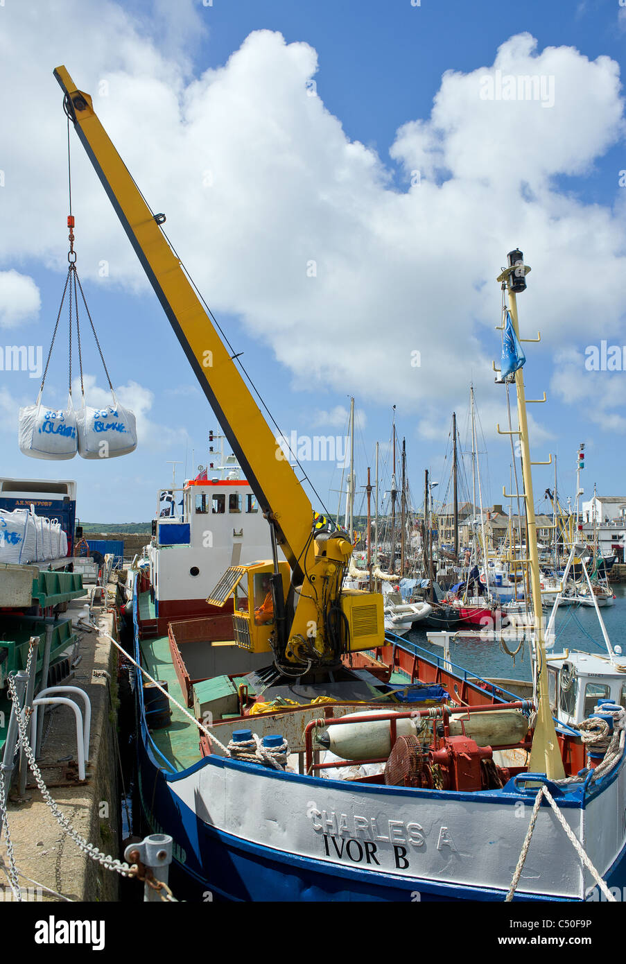 Loading boats moored moorings quay dock docked crane loading hi-res ...