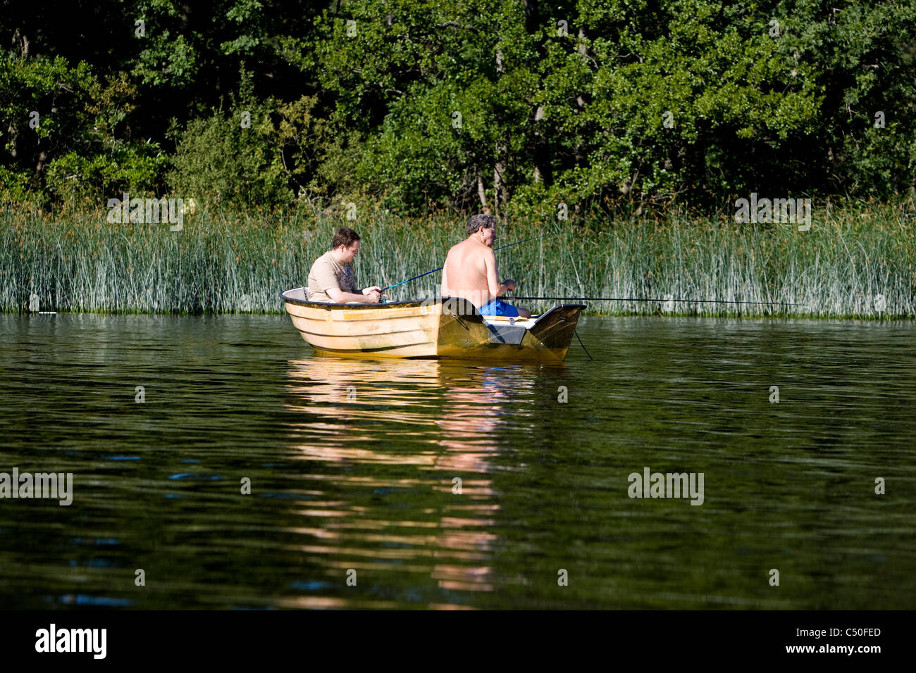 Two men fishing boat hi-res stock photography and images - Alamy