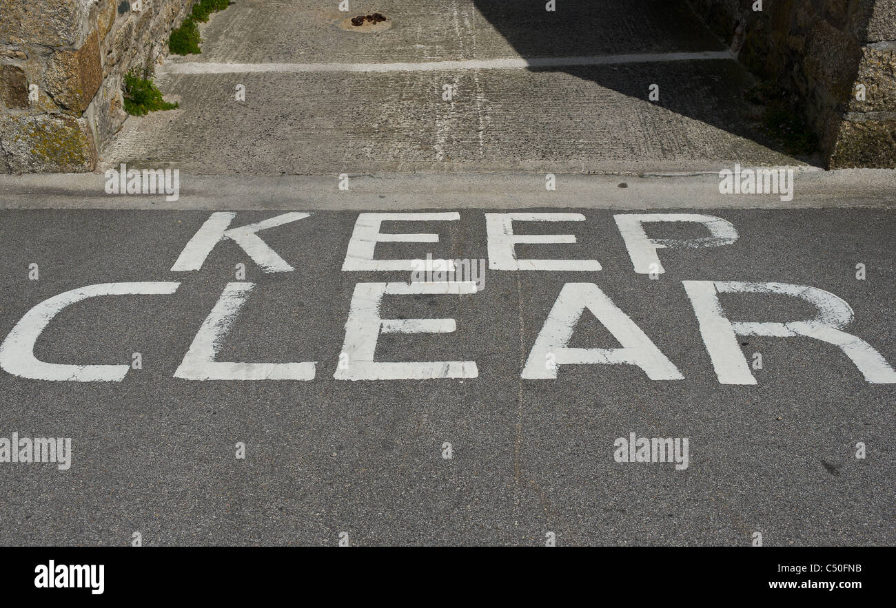 A sign painted on the ground Stock Photo - Alamy