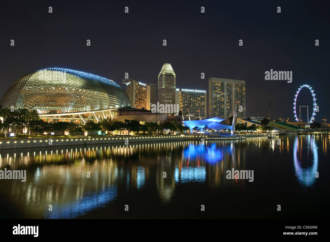 Esplanade Concert Hall at Marina Bay, skyline with Singapore Flyer, night, Singapore, Southeast ...