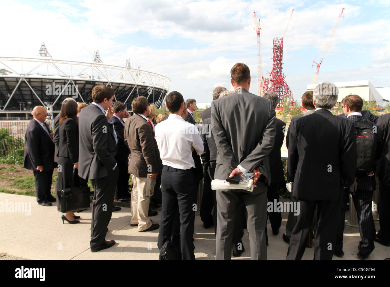 UK. LONDON 2012 OLYMPIC STADIUM. CORPORATE AND BUSINESS VISITORS TAKE A ...