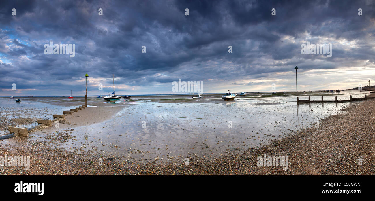 Beach at Low Tide with Threatening Cloud Stock Photo - Alamy