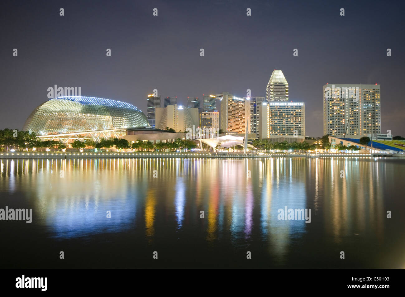 Esplanade Concert Hall at Marina Bay with skyline at night, Singapore, Southeast Asia, Asia ...