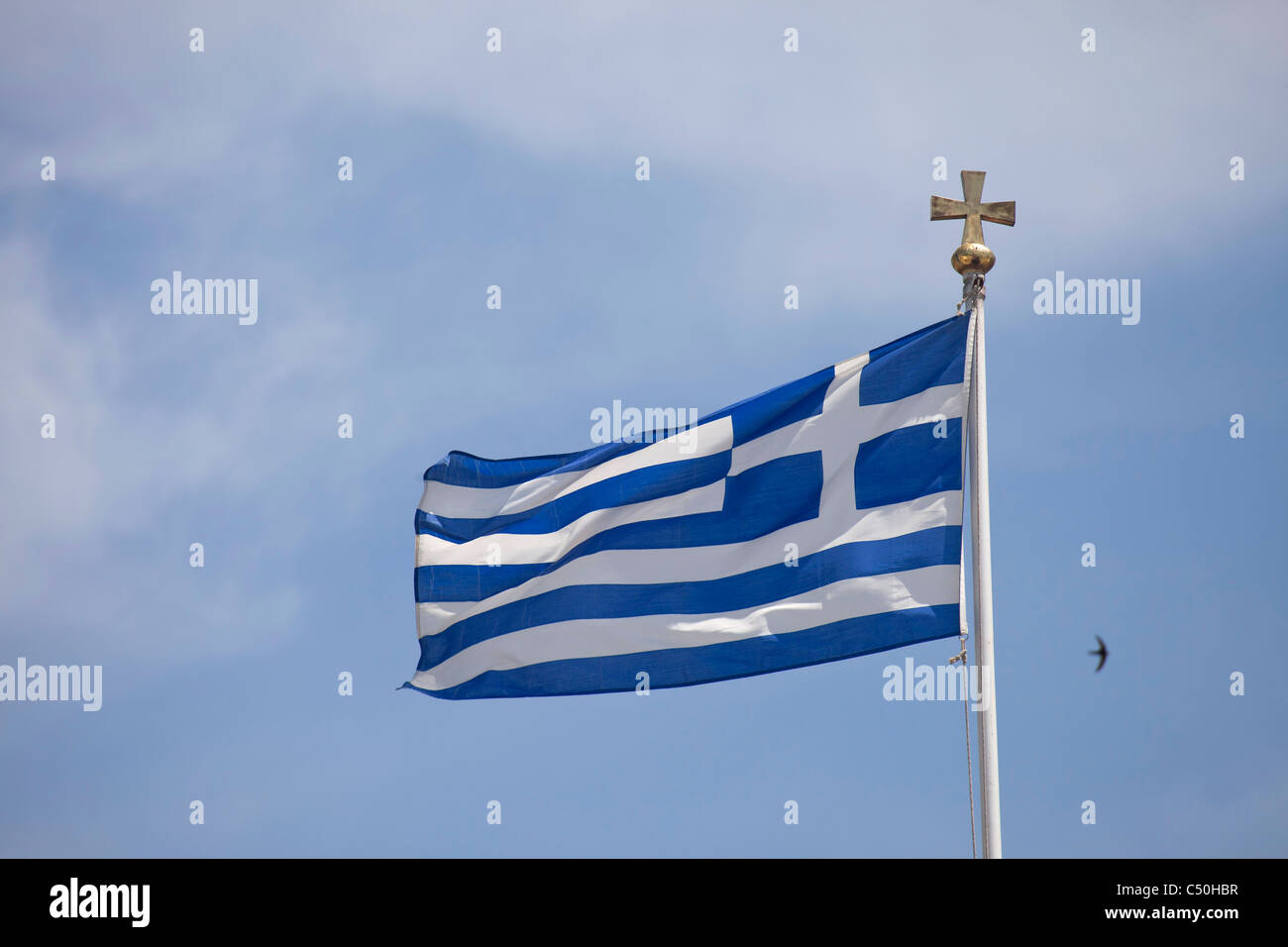 greek flag in the coastal port city Volos in Thessaly on the Greek ...
