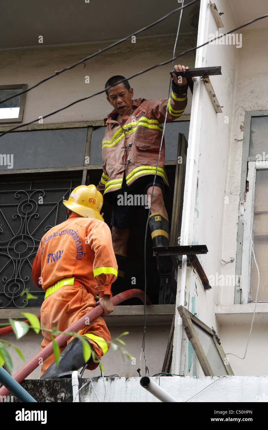 Working firefighter hi-res stock photography and images - Alamy