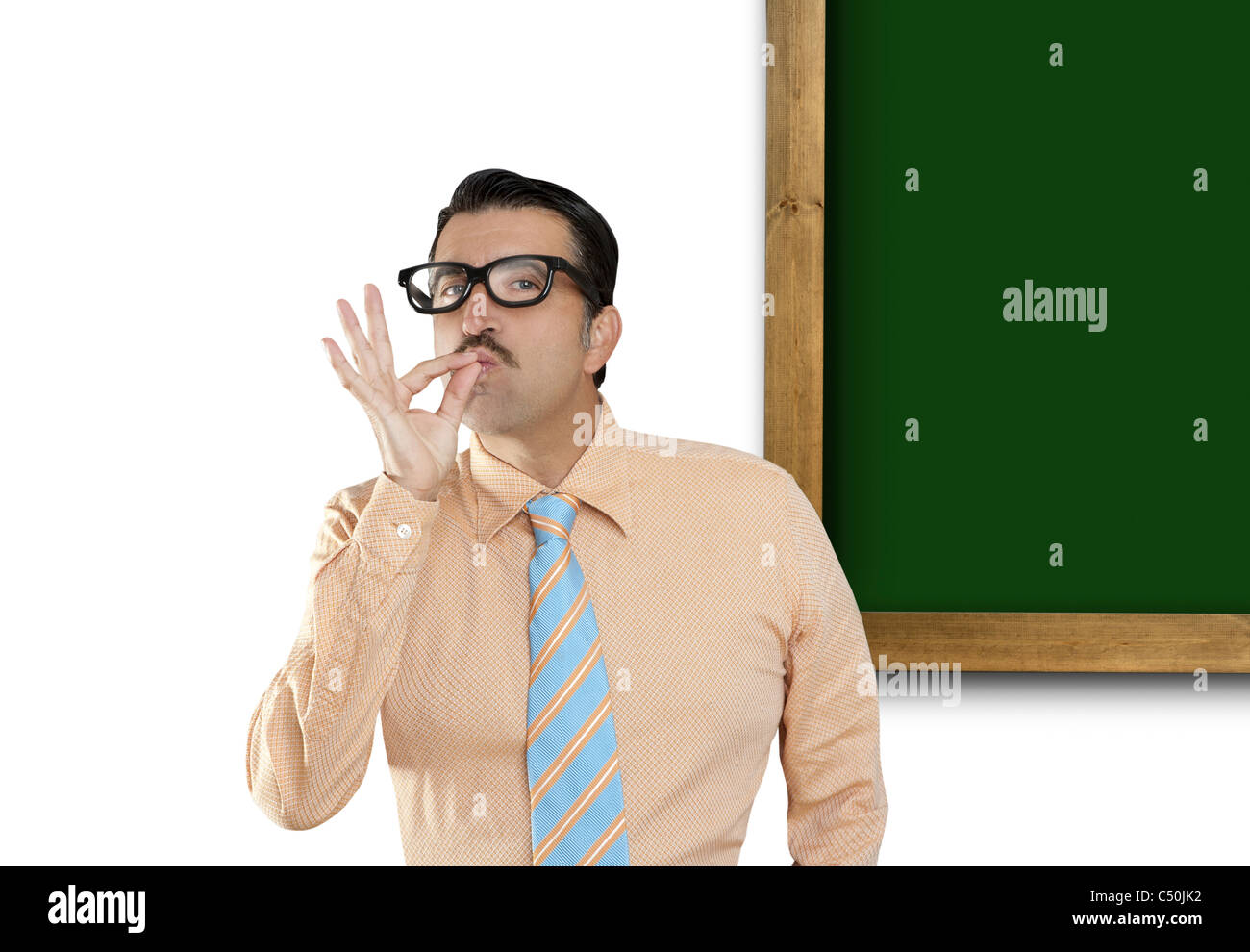 genius nerd with a blank copyspace green blackboard and positive ...