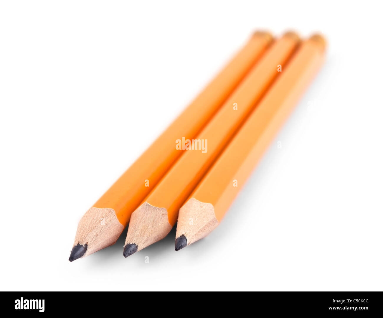 three pencils close-up isolated over white background Stock Photo - Alamy