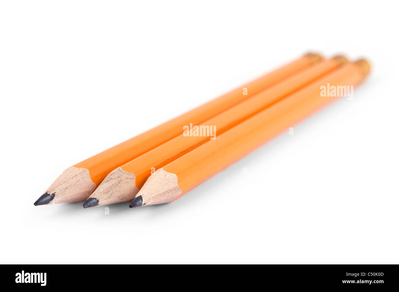 three pencils close-up isolated over white background Stock Photo - Alamy