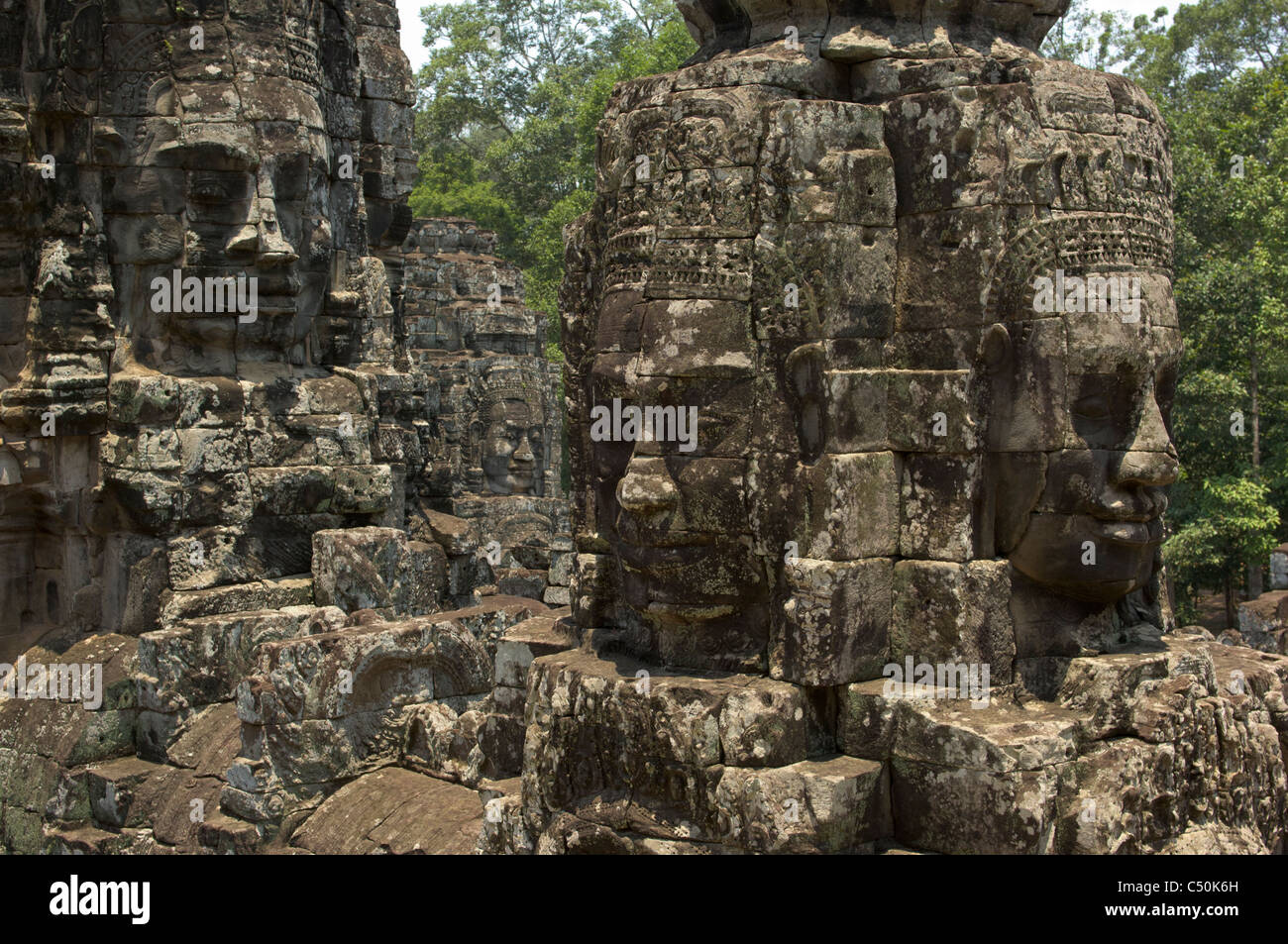 Enigmatic stone carved faces of The Bayon, Angkor Thom complex, Angkor ...