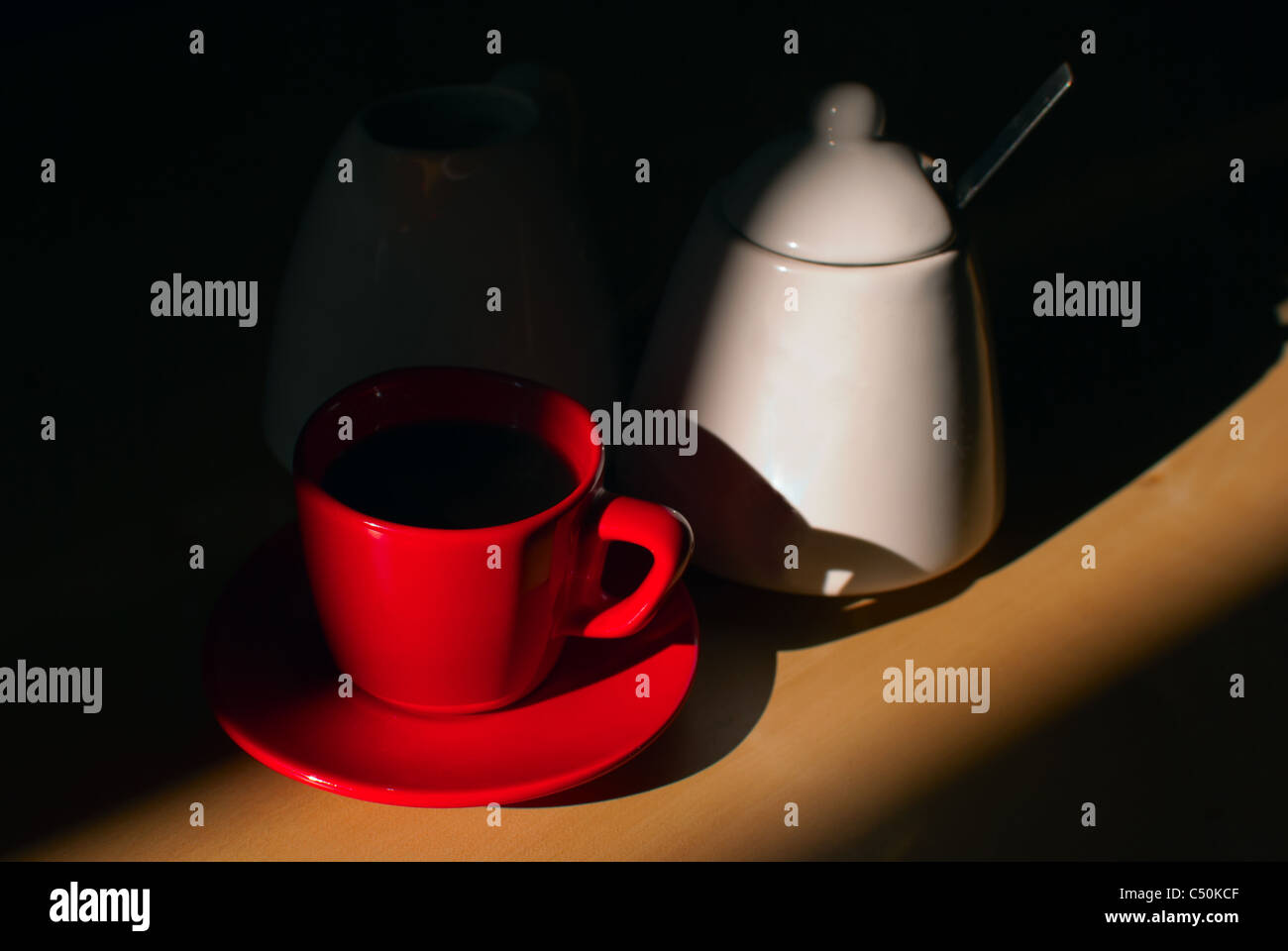 Espresso Coffee and Sugar Basin in Light Beam Stock Photo - Alamy