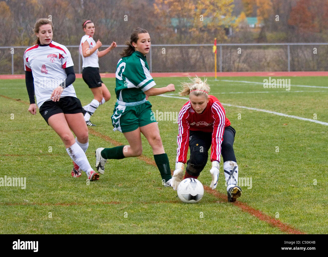 High School Girls Womens Soccer Football Players With Goalkeeper