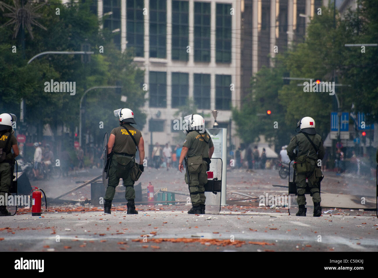 Riot police in Panepistimiou street during the the protests in Athens ...