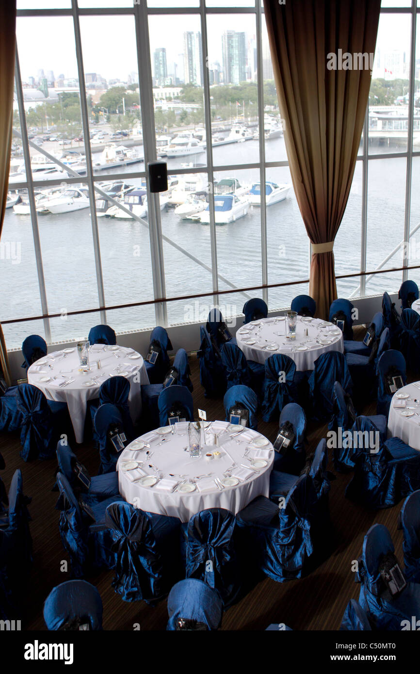 banquet hall empty tables tall windows Stock Photo - Alamy