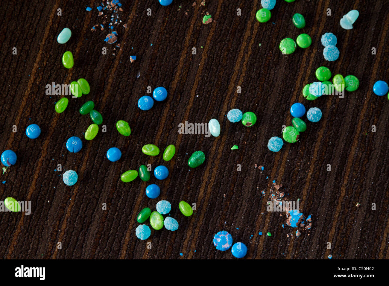 garbage rubbish candy sweet floor carpet Stock Photo - Alamy