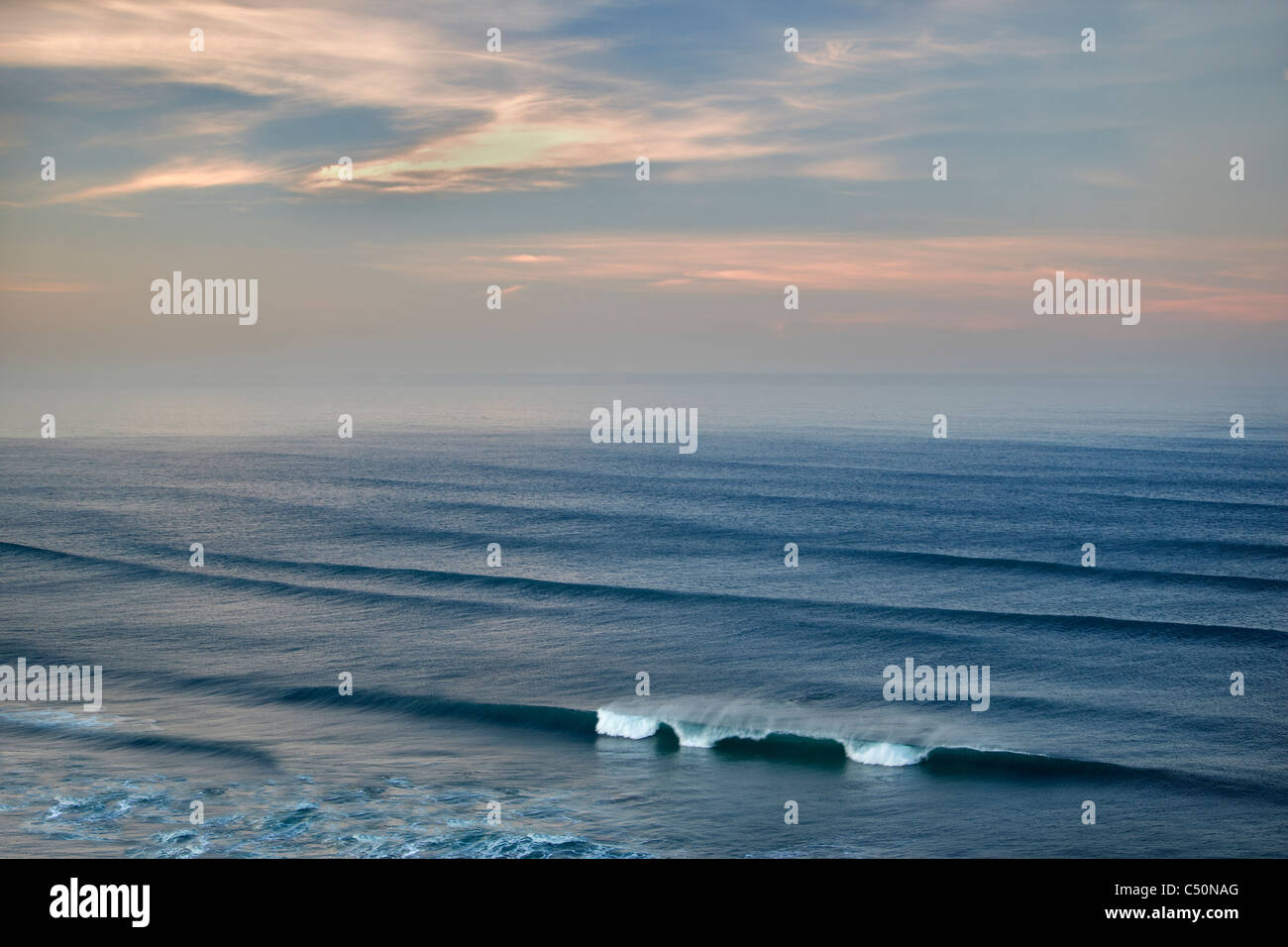 Sunrise and clouds with waves. Cannon Beach. Oregon Stock Photo - Alamy