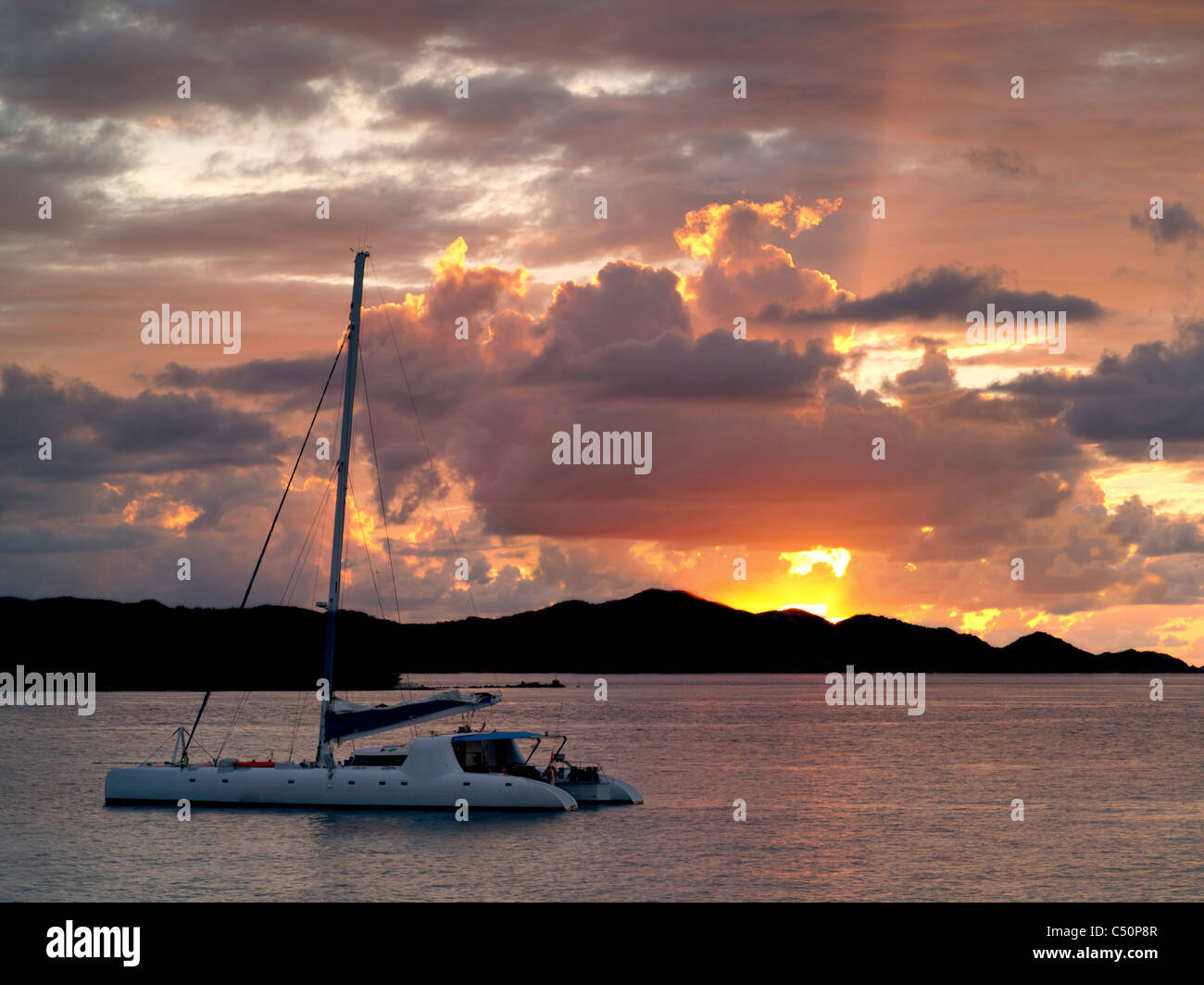 Sailboat off St. John, Virgin Islands and sunset Stock Photo - Alamy